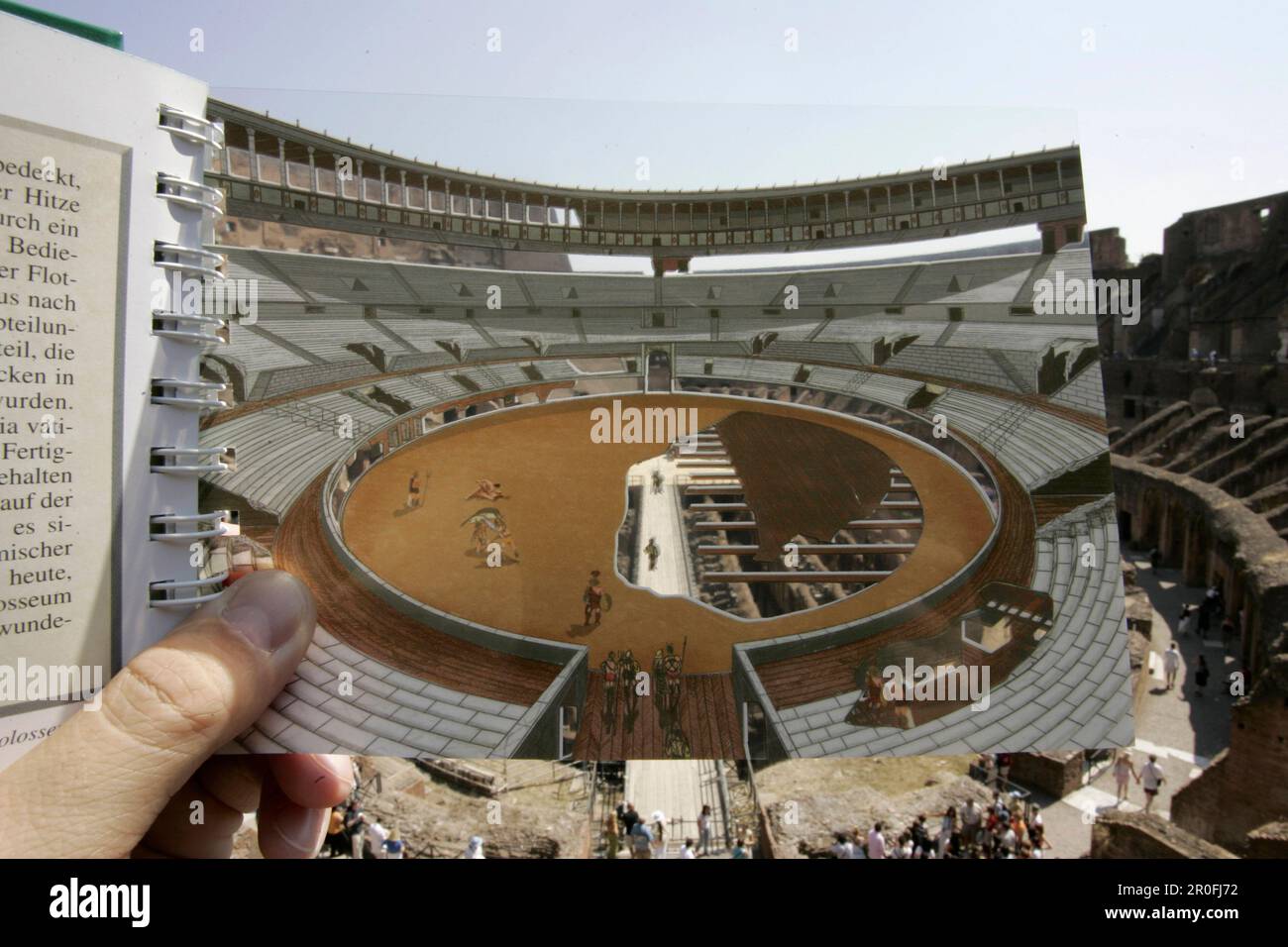 View through transparent page of a travel guide, Colosseum, Rome, Italy ...