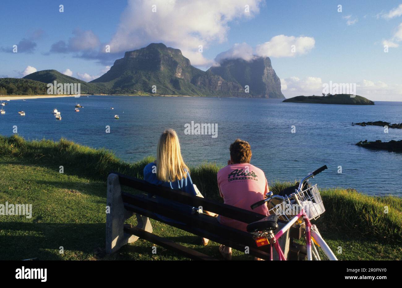 People looking across the lagoon to Mt. Lidgbird and Mt. Gower, Lord ...