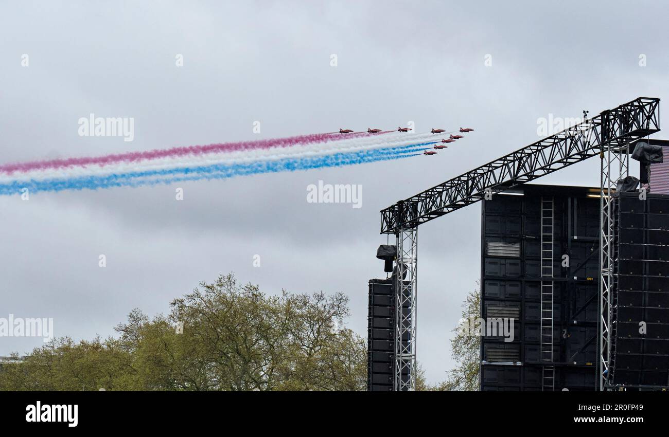 The Royal Air Force Red Arrows aerial display team fly over the display ...