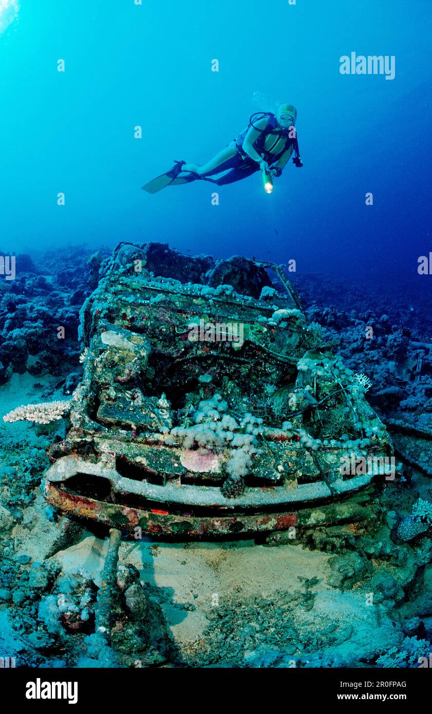Scuba diver and Car wreck near Blue Belt shipwreck, Sudan, Africa, Red ...