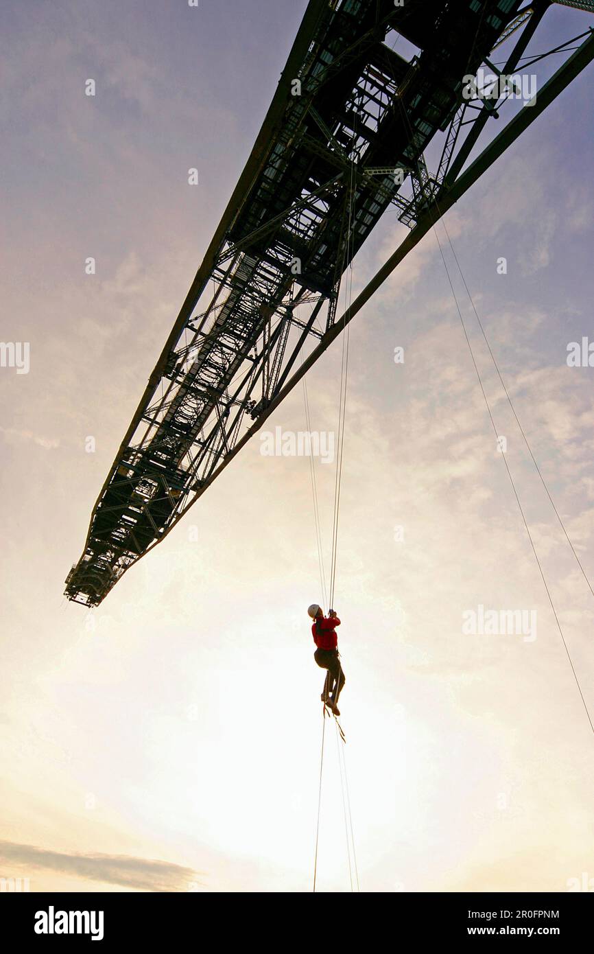 Person climbing on an overburden conveyor bridge F 60, Mining ...