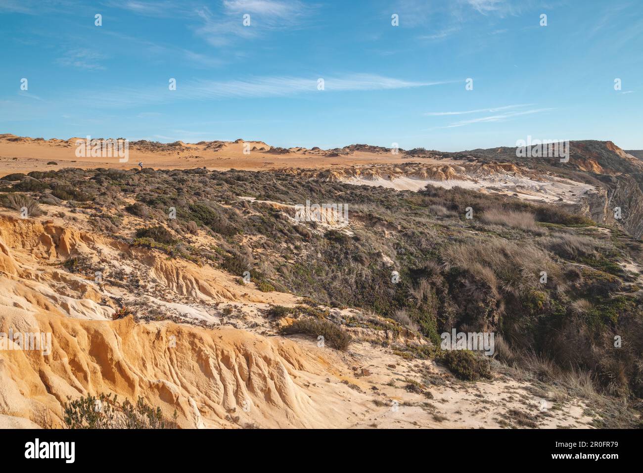 Lunar, dry landscape with crumbling limestone and sandy surface in the ...