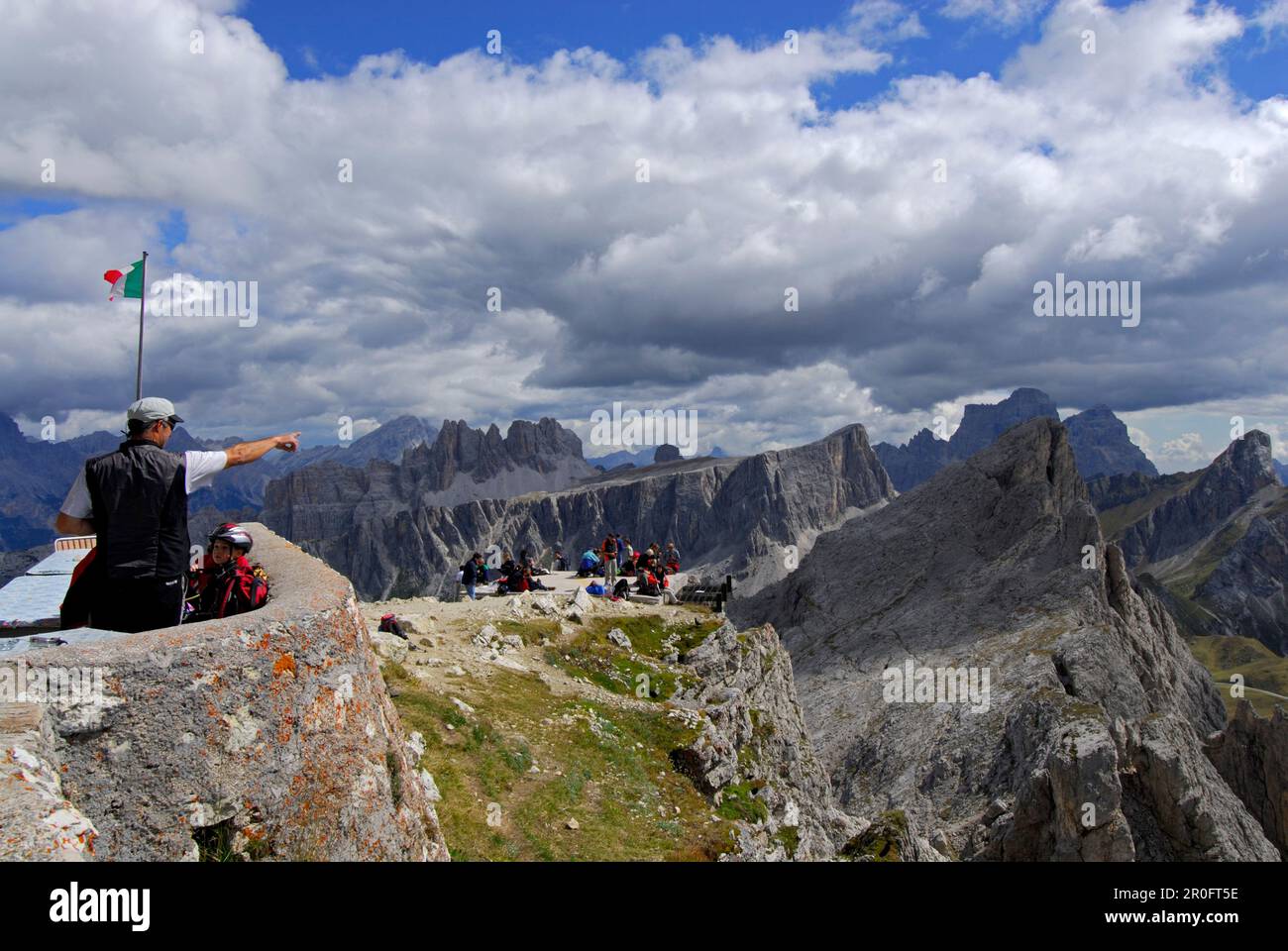 hikers at summit of Nuvolau, in background Croda da Lago, Monte Formin ...