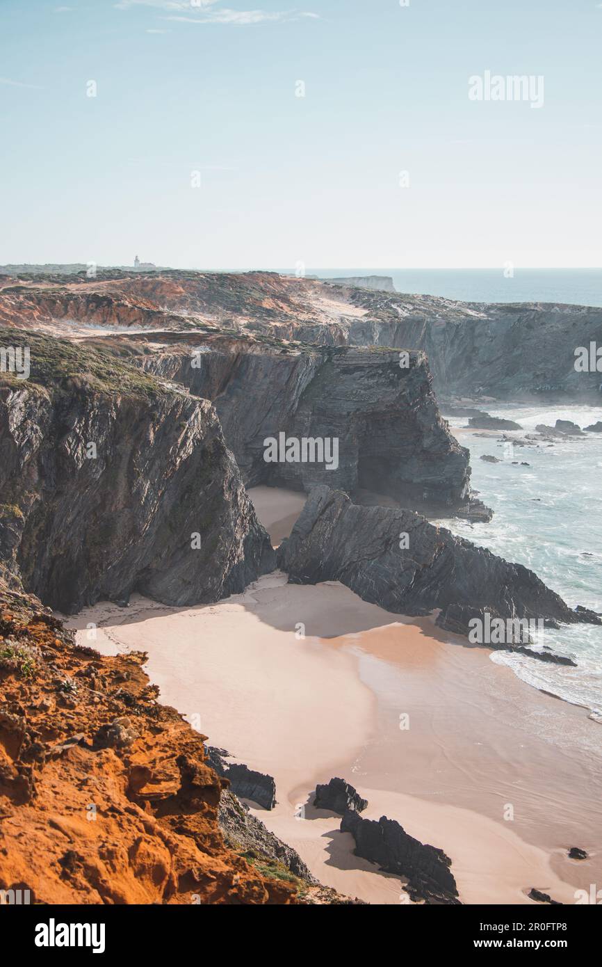 Typical scenery on the Atlantic coast. High rocky cliffs with sandy ...