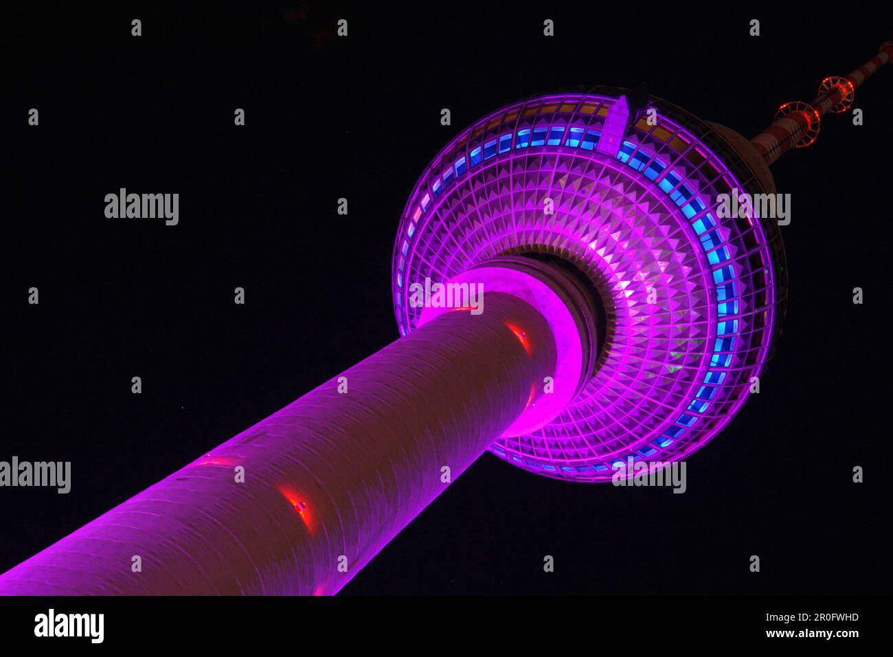 Illuminated Television Tower at night, View from foot of the tower ...