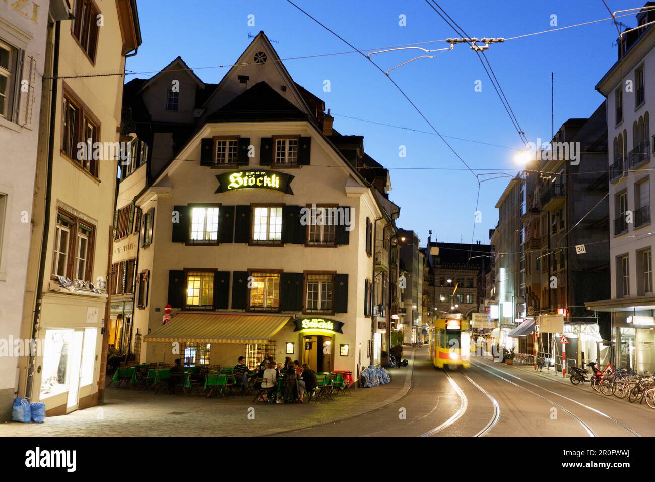 Town square at night, Barfuesserplatz with Restaurant Stoeckli, Basel ...