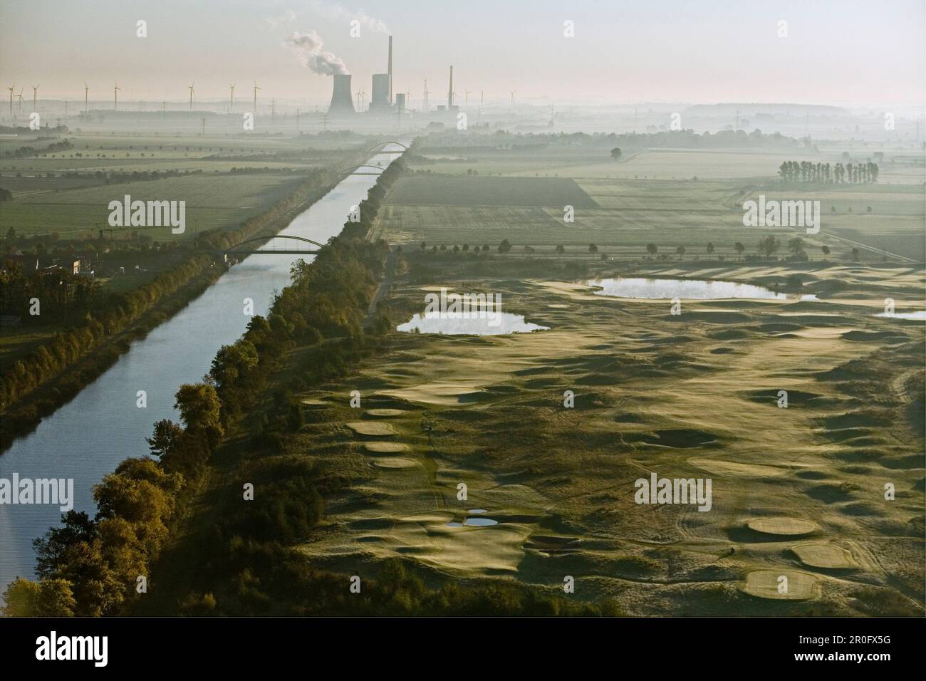 Aerial shot of Mittelland Kanal (midland canal) and coal-fired power ...