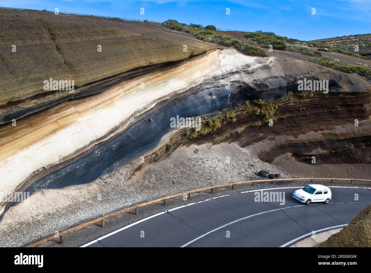 A car driving on a country road at Teide National Park, Tenerife ...