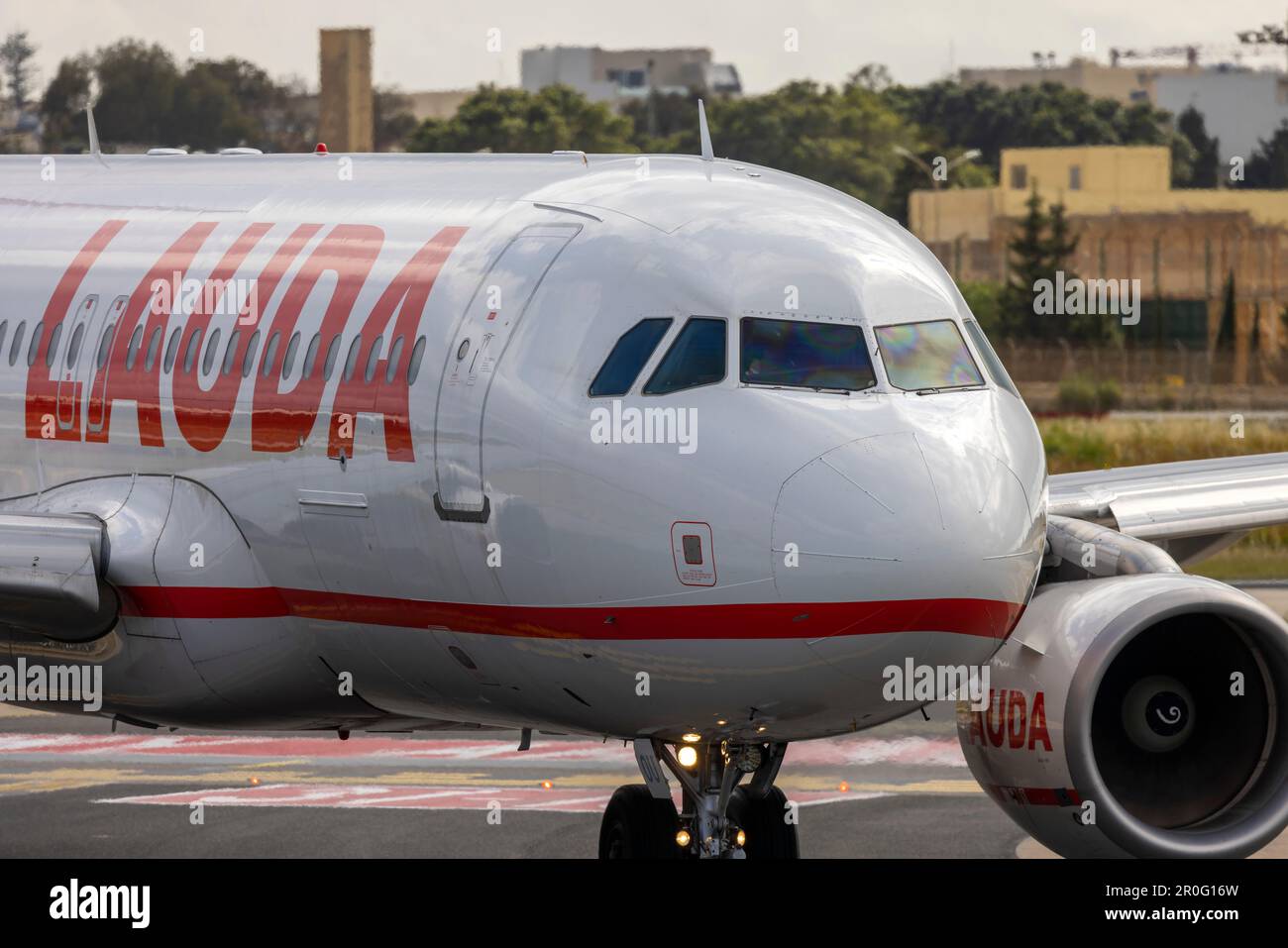 Lauda Europe Airbus A320-214 (REG: 9H-LOU) entering taxiway Delta after ...