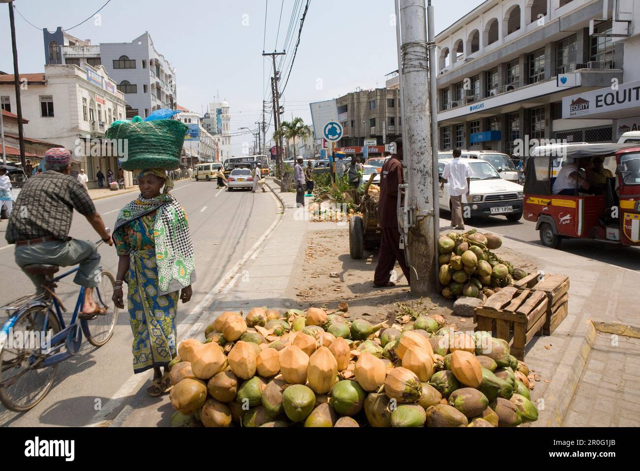 Kenyan woman carrying basket on her head at Digo Road, Downtown Mombasa ...