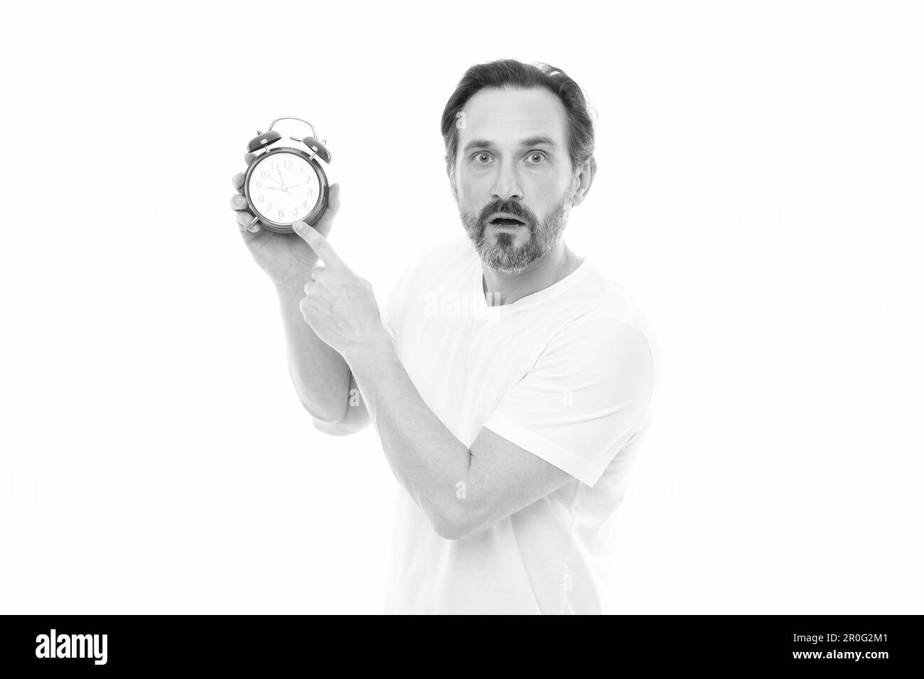 man pointing finger on alarm clock at background. photo of man with ...