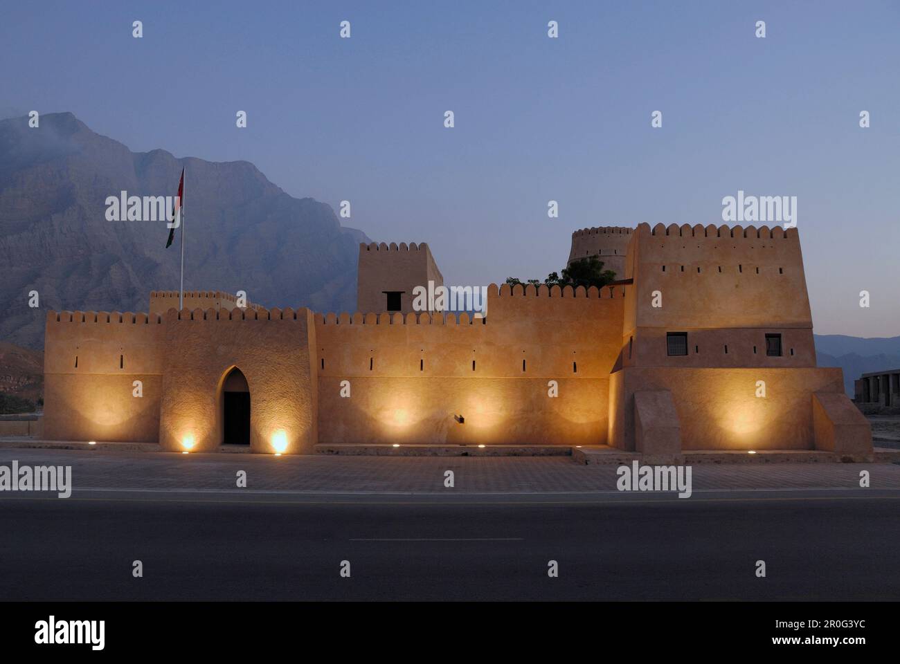 Illuminated fort at dusk, Bukha, Musandam, Oman, Asia Stock Photo - Alamy