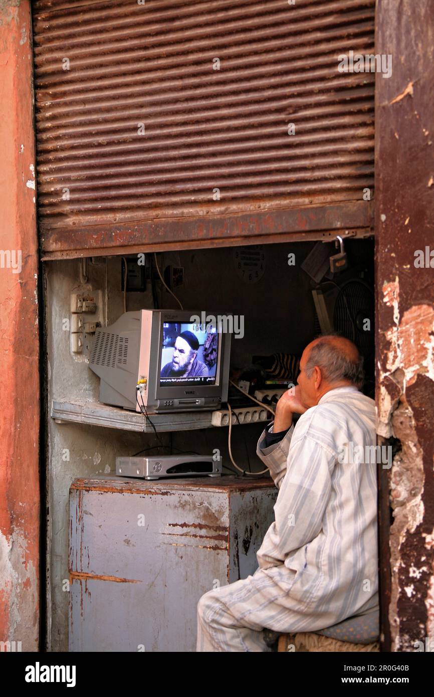 Watching tv outside africa hi-res stock photography and images - Alamy