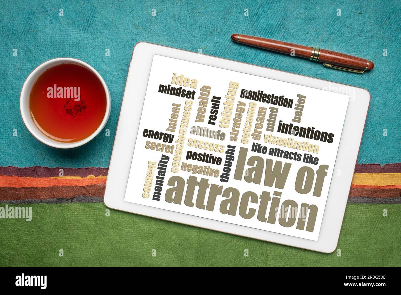 law of attraction word cloud on a digital tablet Stock Photo - Alamy