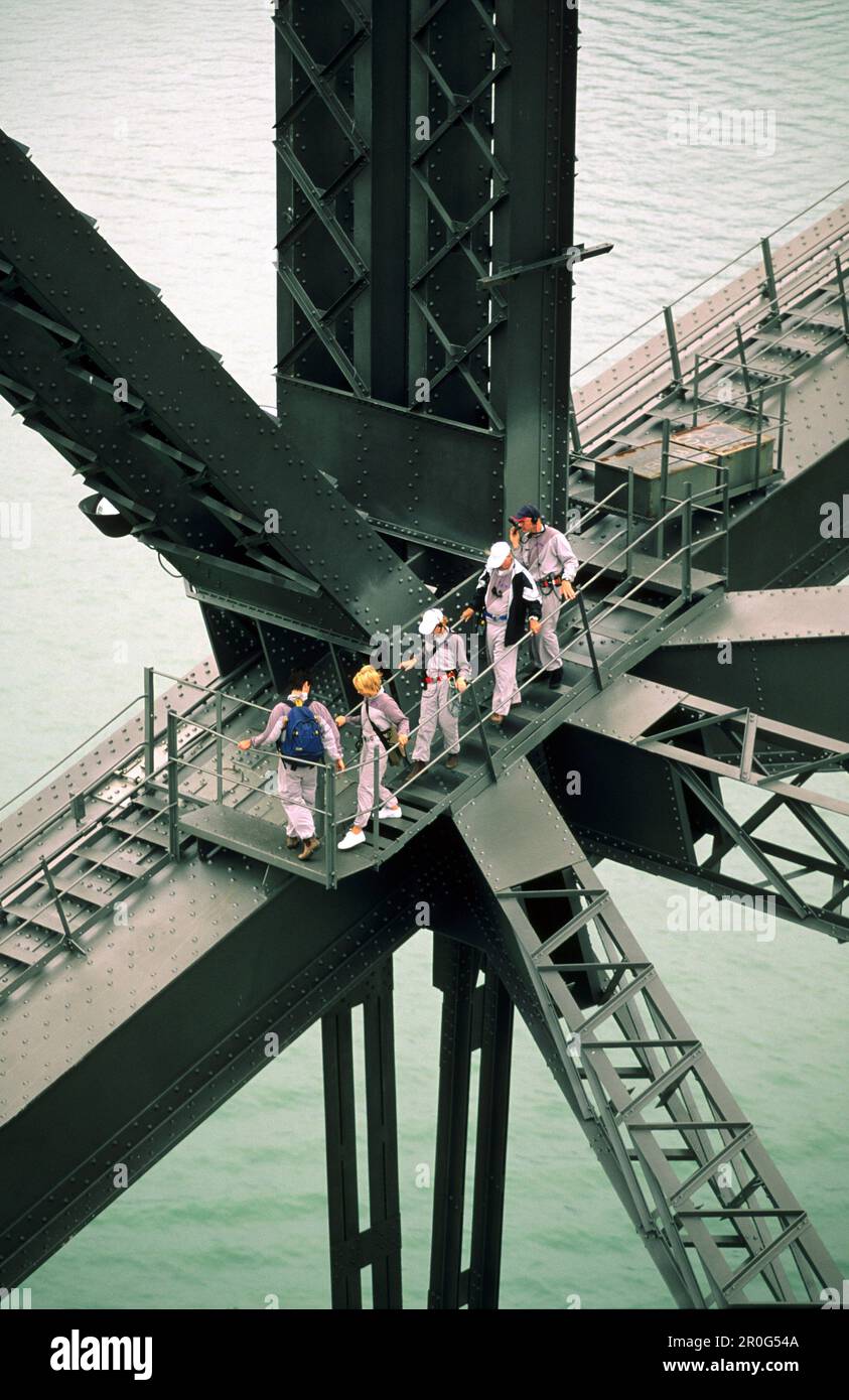 People climbing on the steel beam of the Harbour Bridge, Sydney, New ...