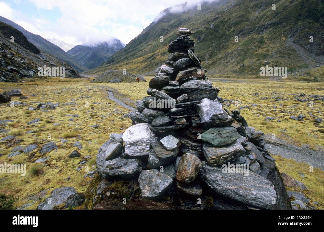 Cairn on the Rees Dart Track at upper Dart Valley, Mt. Aspiring ...