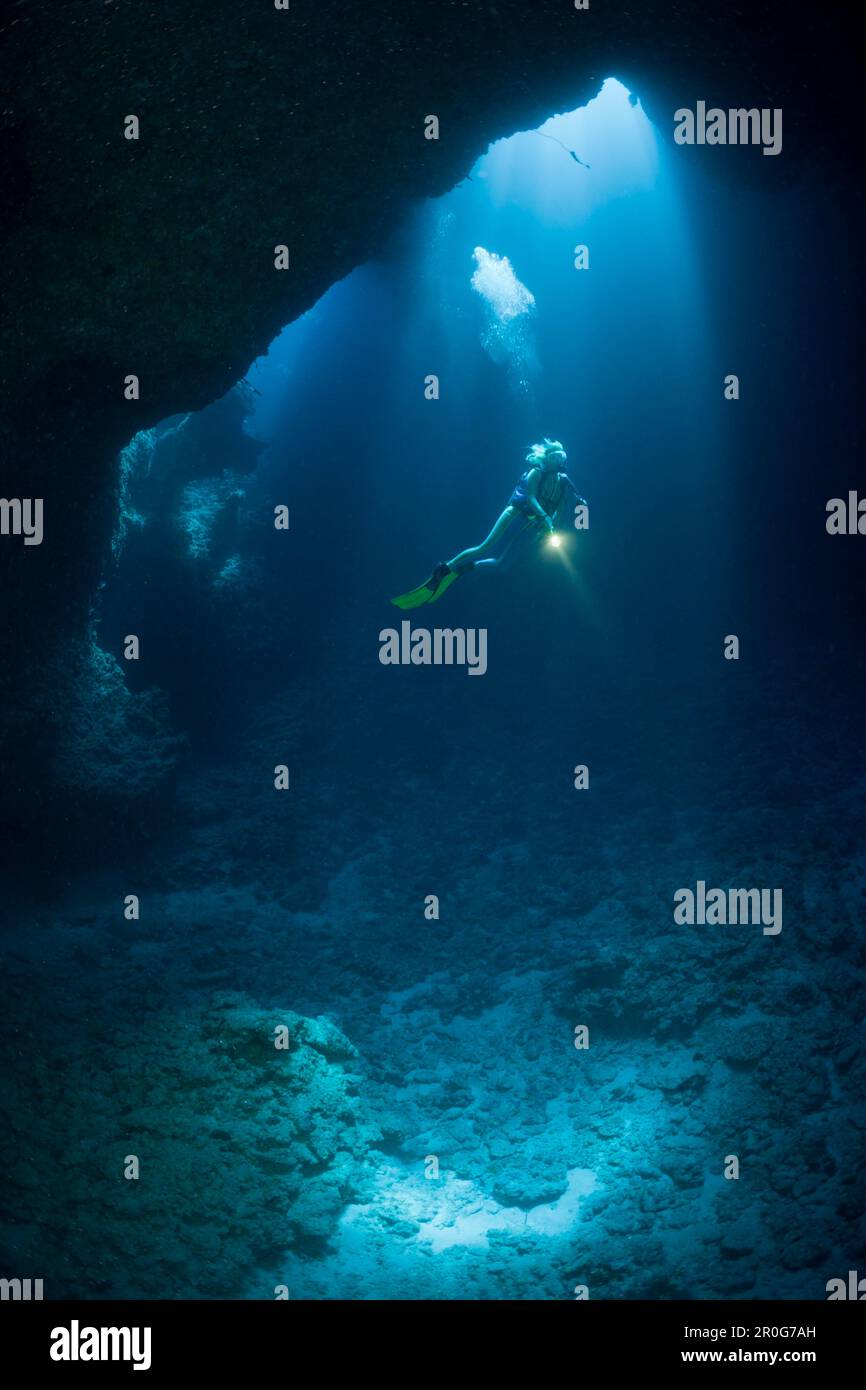 Diver in Blue Hole Cave, Micronesia, Palau Stock Photo - Alamy