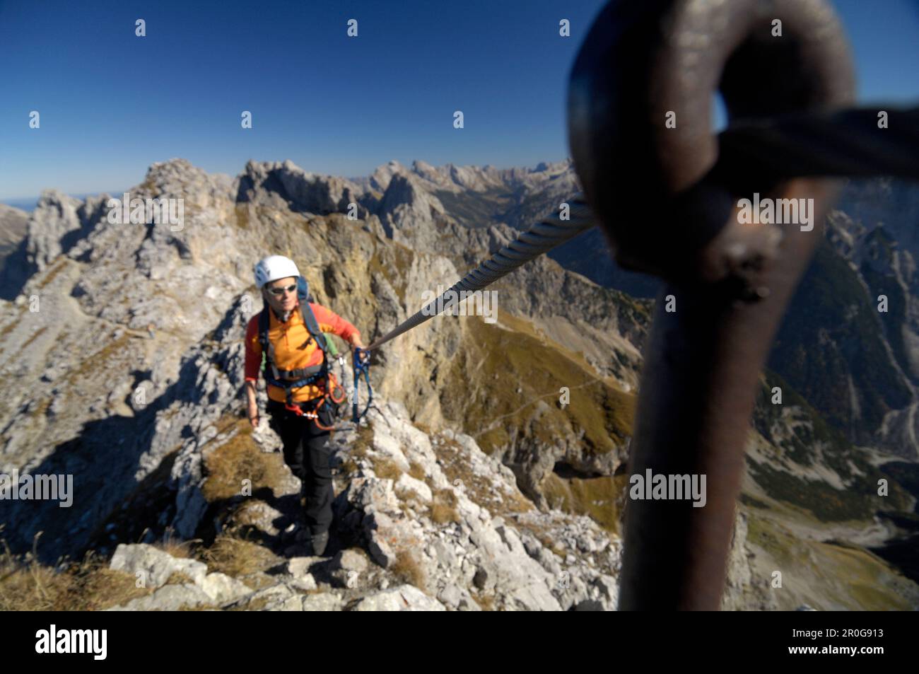 Woman on the Mittenwalder Klettersteig, Mittenwalder Hoehenweg, Fixed ...