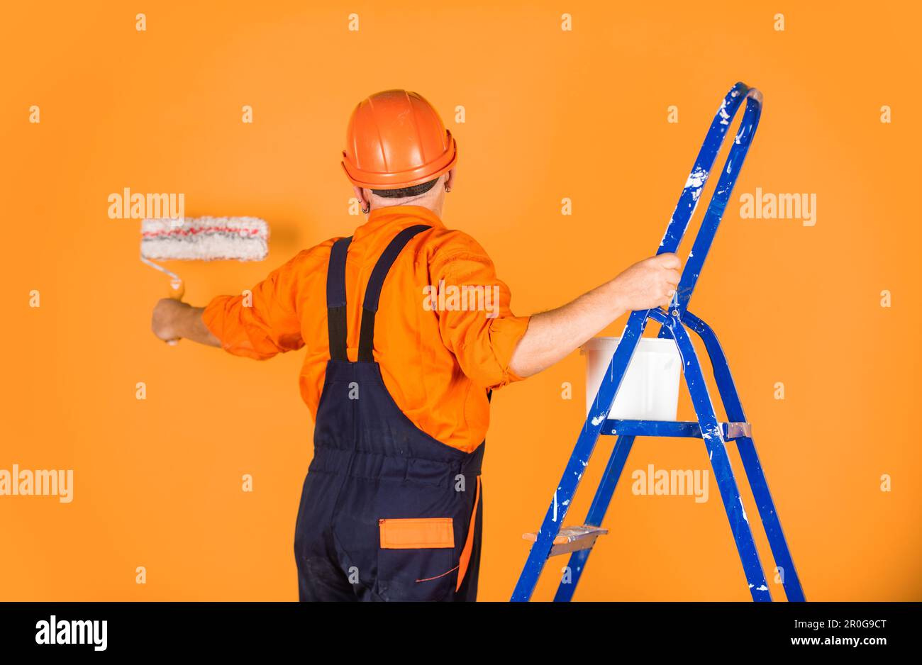 Build your future yourself. work in apartment. Craftsman With Paint ...