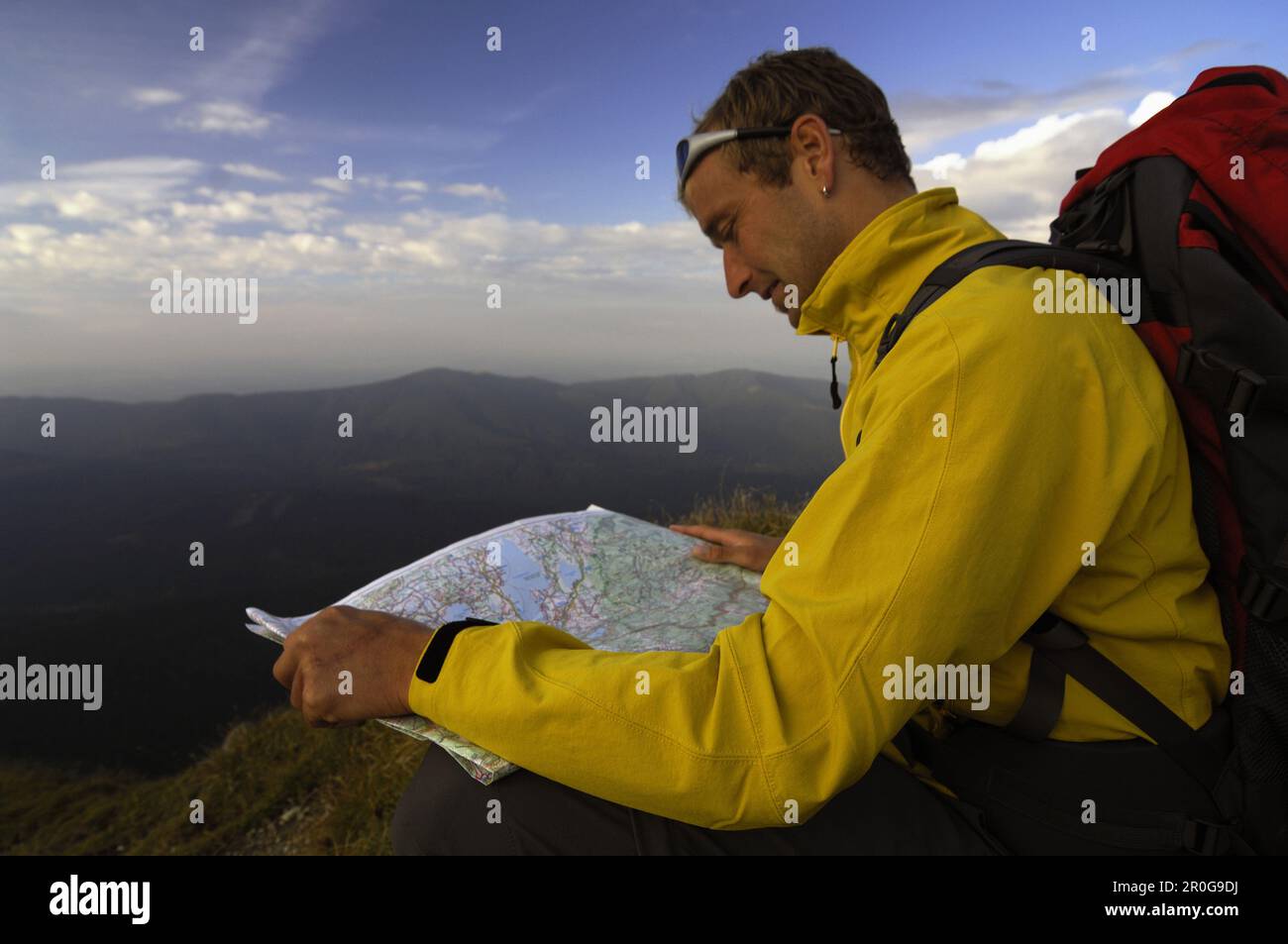 Hiker reading map, Klammspitze, Bavaria, Germany Stock Photo - Alamy