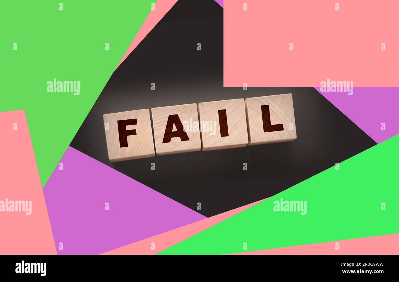 FAIL Word text Written In Wooden Cube blocks on black background ...
