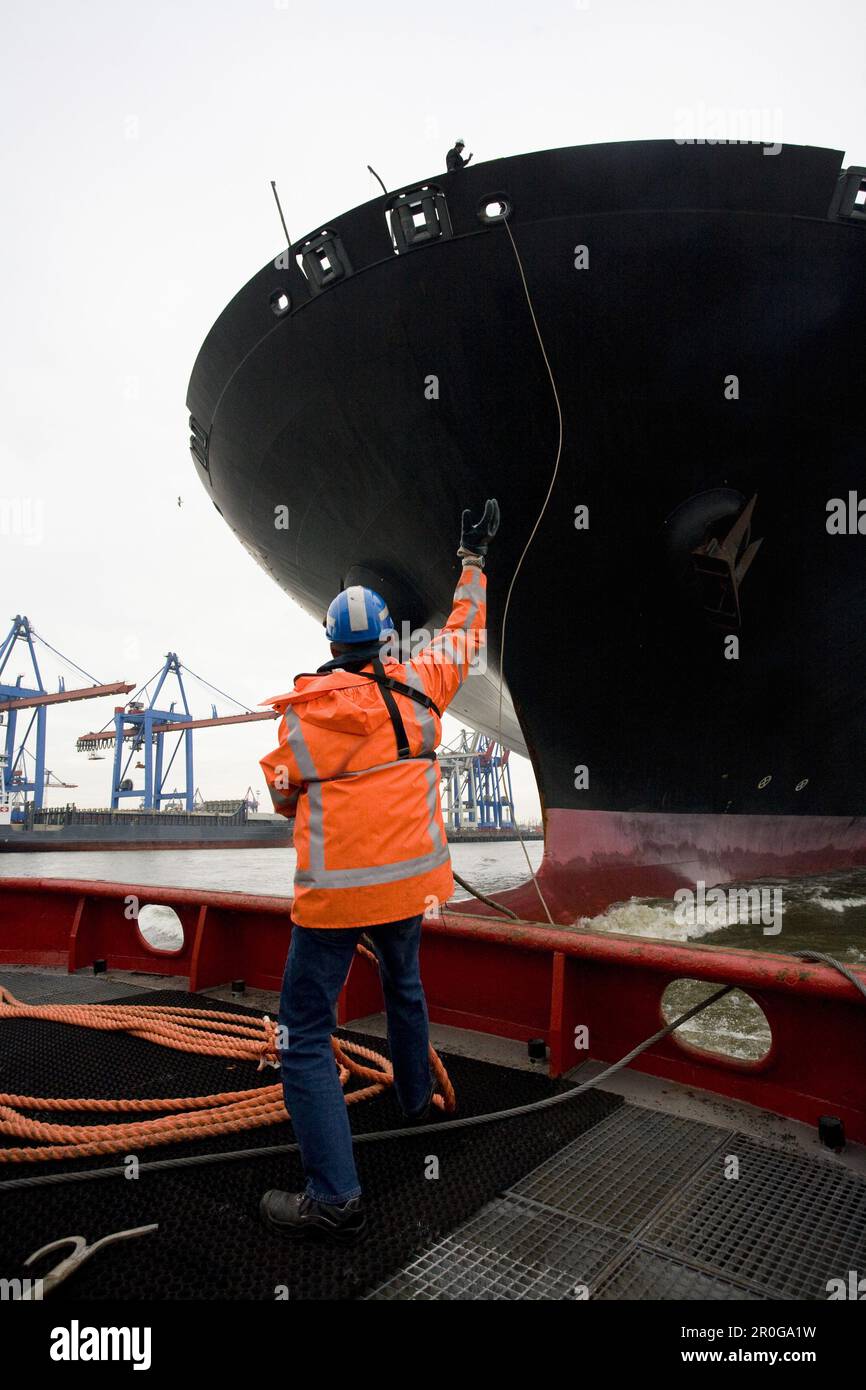 Container ship landing at pier, Port of Hamburg, Germany Stock Photo ...