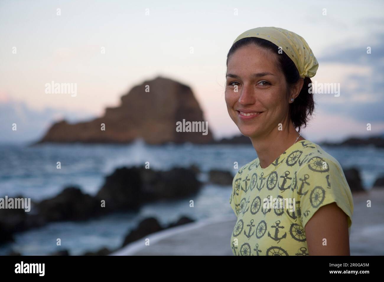 Portrait of friendly tourist from Slovakia on a rocky beach, Porto ...