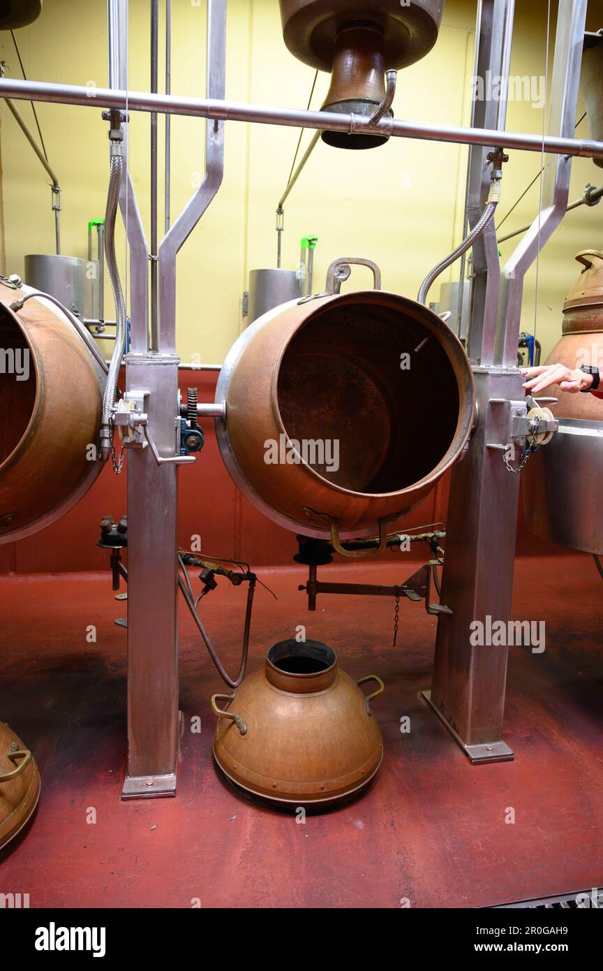 Gin alcoholic drink distillation process in copper tanks in Spanish ...