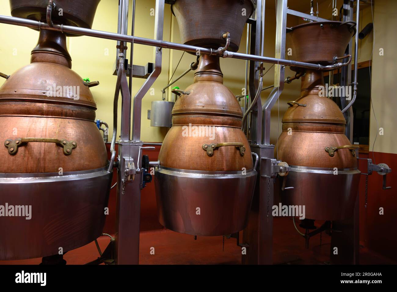 Gin alcoholic drink distillation process in copper tanks in Spanish ...