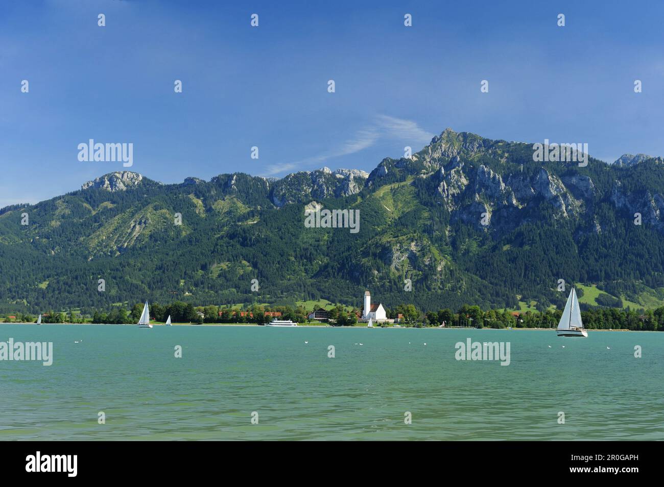 Lake Forggensee with sailboats, Ammergau Alps, East Allgaeu, Bavaria ...
