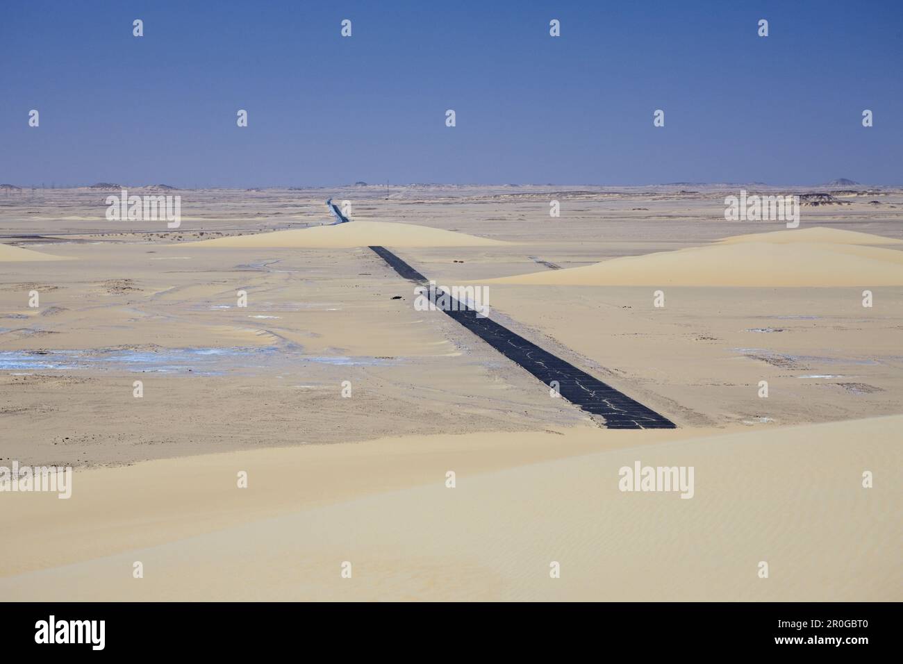 Drifting Sand Dunes crossing Street, Libyan Desert, Egypt Stock Photo ...