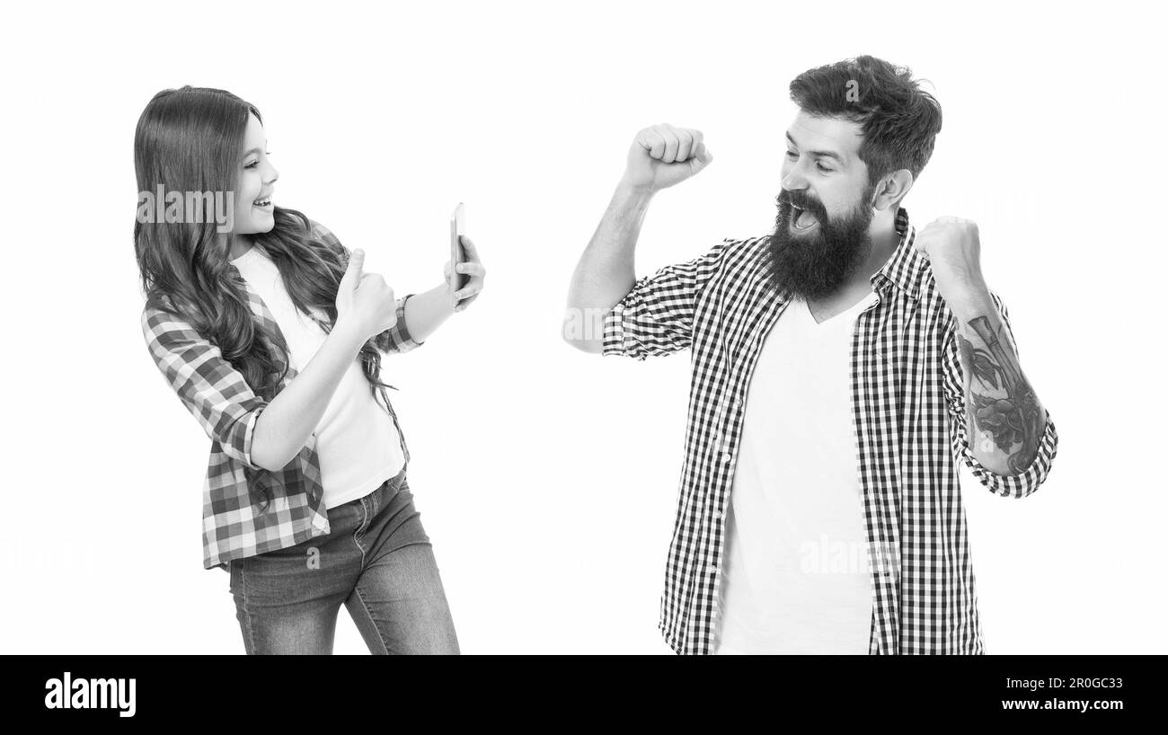 Happy girl daughter show thumbs up and take photo of euphoric man ...