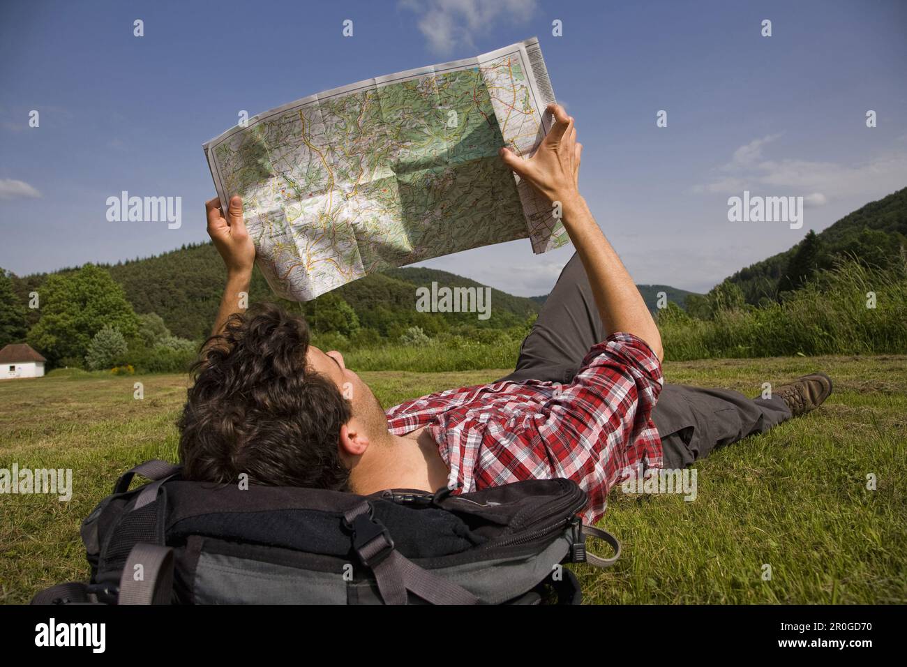 Hiker reading a map, Fischbach bei Dahn, Palatine Forest, Rhineland ...