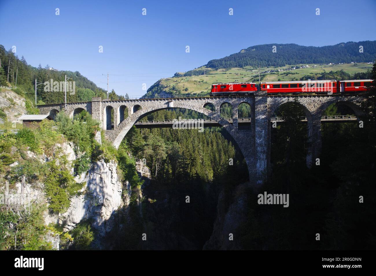 Train passing Solis Viaduct, Schin gorge, Canton of Grisons ...