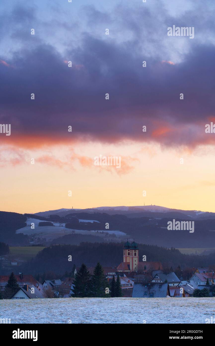 View ot Sankt Margen with monastery in sunset, mount Feldberg in background, Black Forest, Baden ...