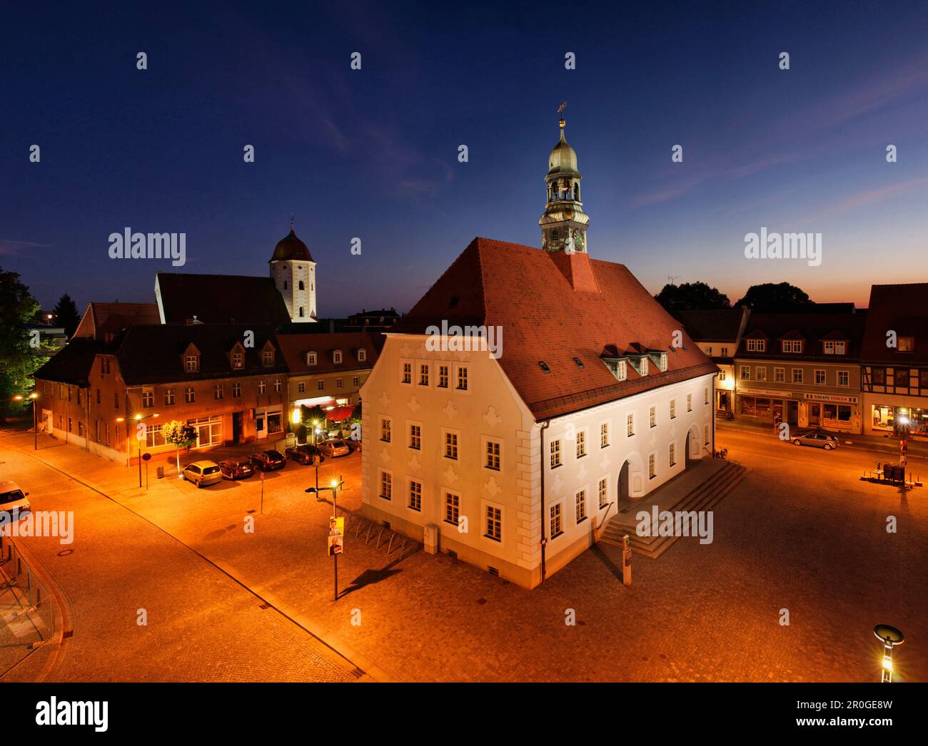 Market square with town hall and town church at night, Finsterwalde ...