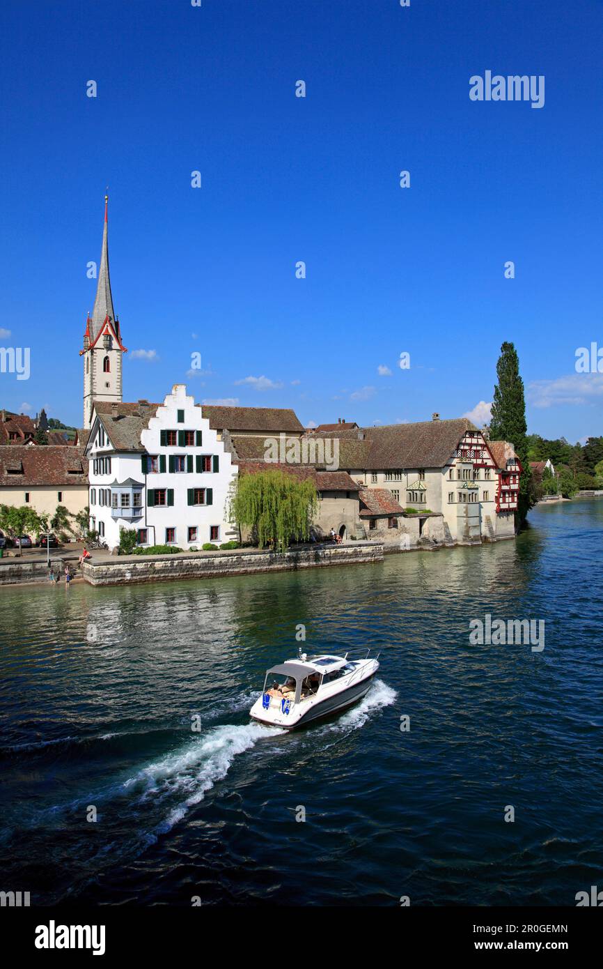 Boat on the lake and St. Georgen monastery in the sunlight, Stein am ...