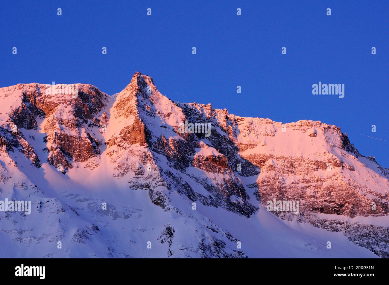 Hoher Sonnblick with Zittelhaus hut at the summit at dawn, Rauriser Tal ...