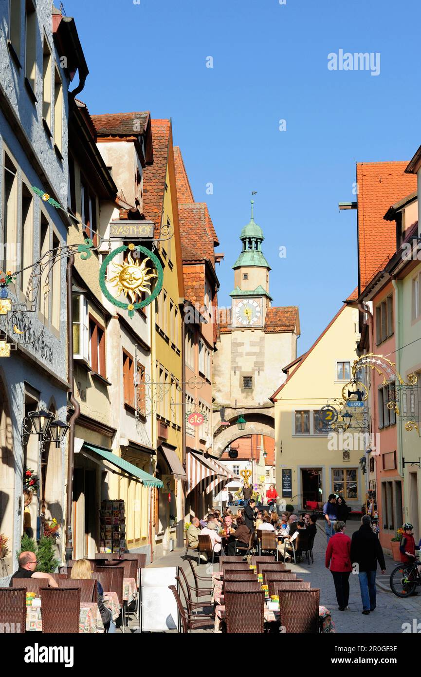 Street scene with Roederbogen city gate in the background, Rothenburg ...