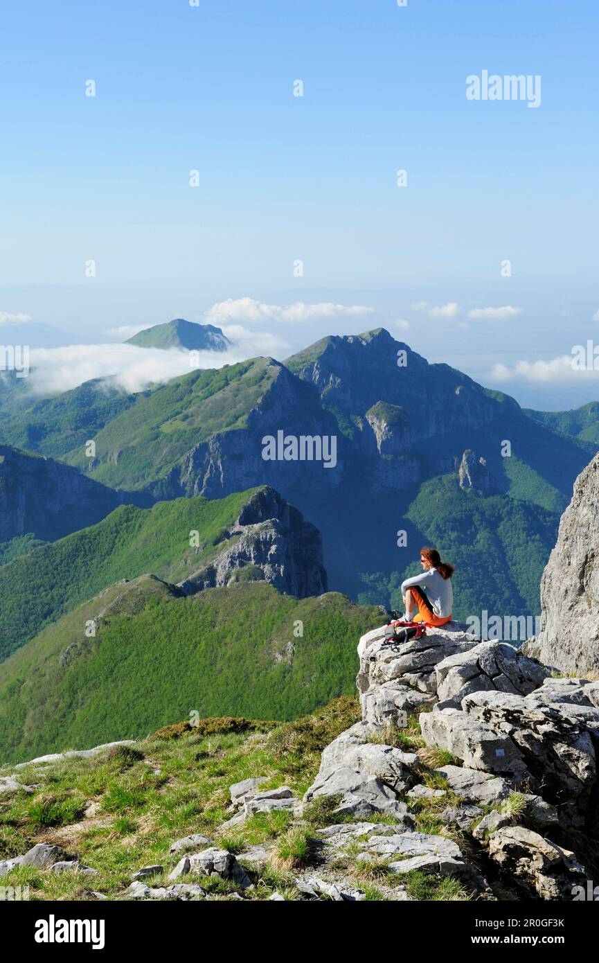 Woman enjoying view over Alpi Apuane, Rifugio Rossi, Pania della Croce ...
