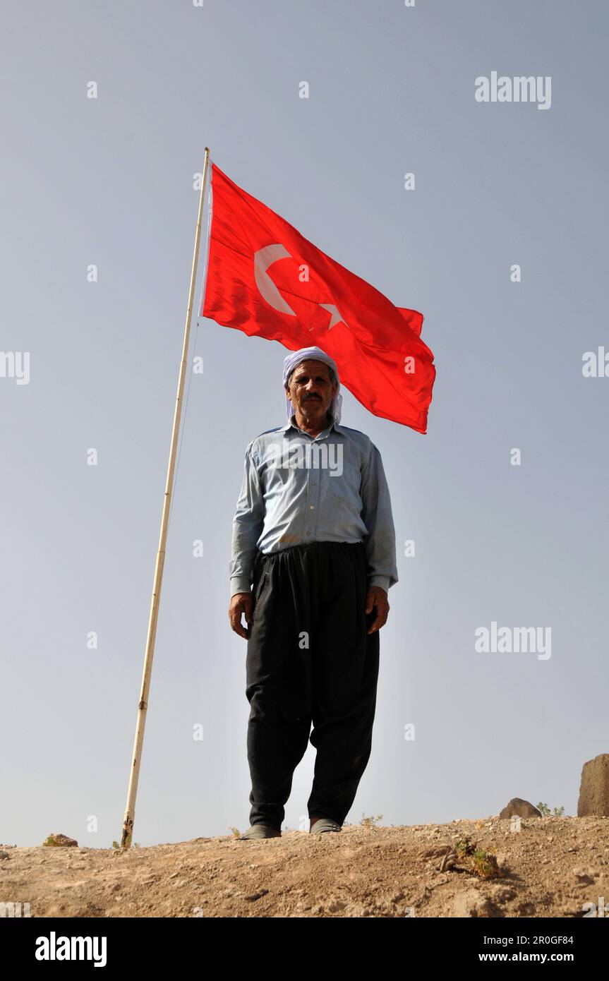 Older man with a Turkish flag in Harran near Sanliurfa, southeast ...