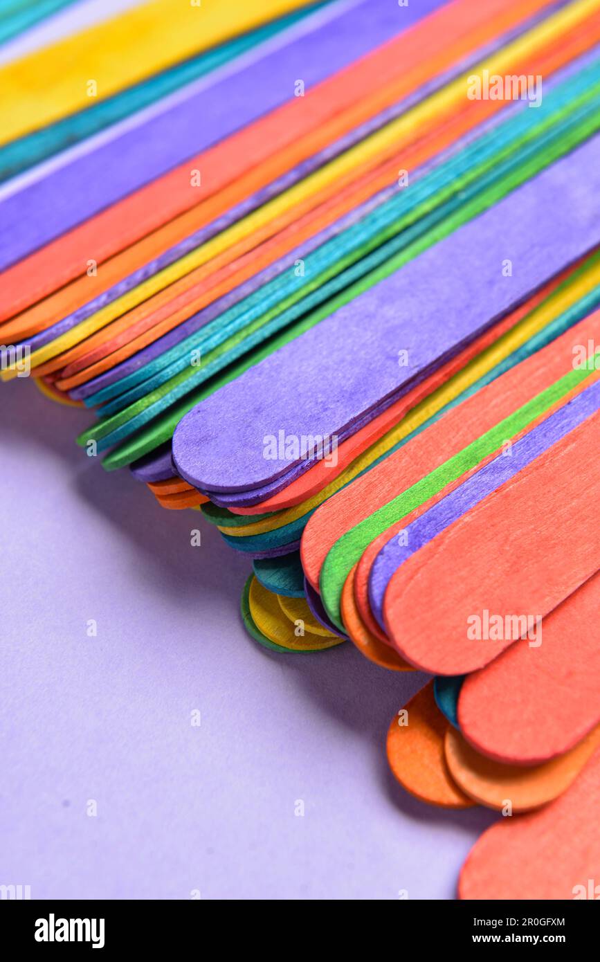 Colorful ice cream sticks on purple background, closeup Stock Photo - Alamy