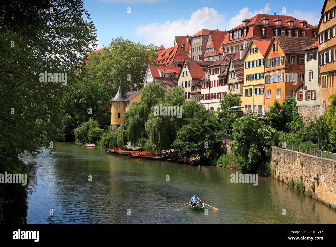 Rowboat at Neckar river, water front with Hölderlin tower, Tübingen ...