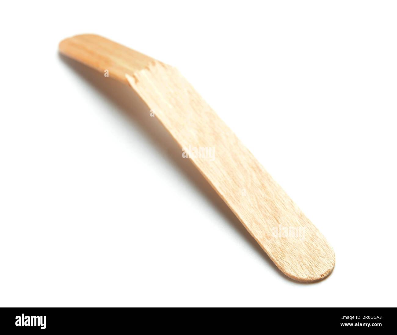 Broken ice cream stick on white background Stock Photo - Alamy