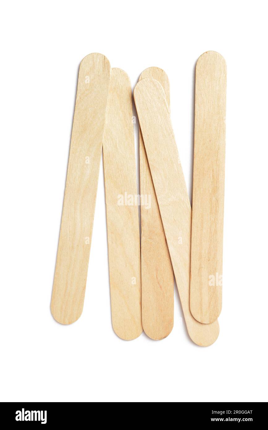 Ice cream sticks on white background Stock Photo - Alamy