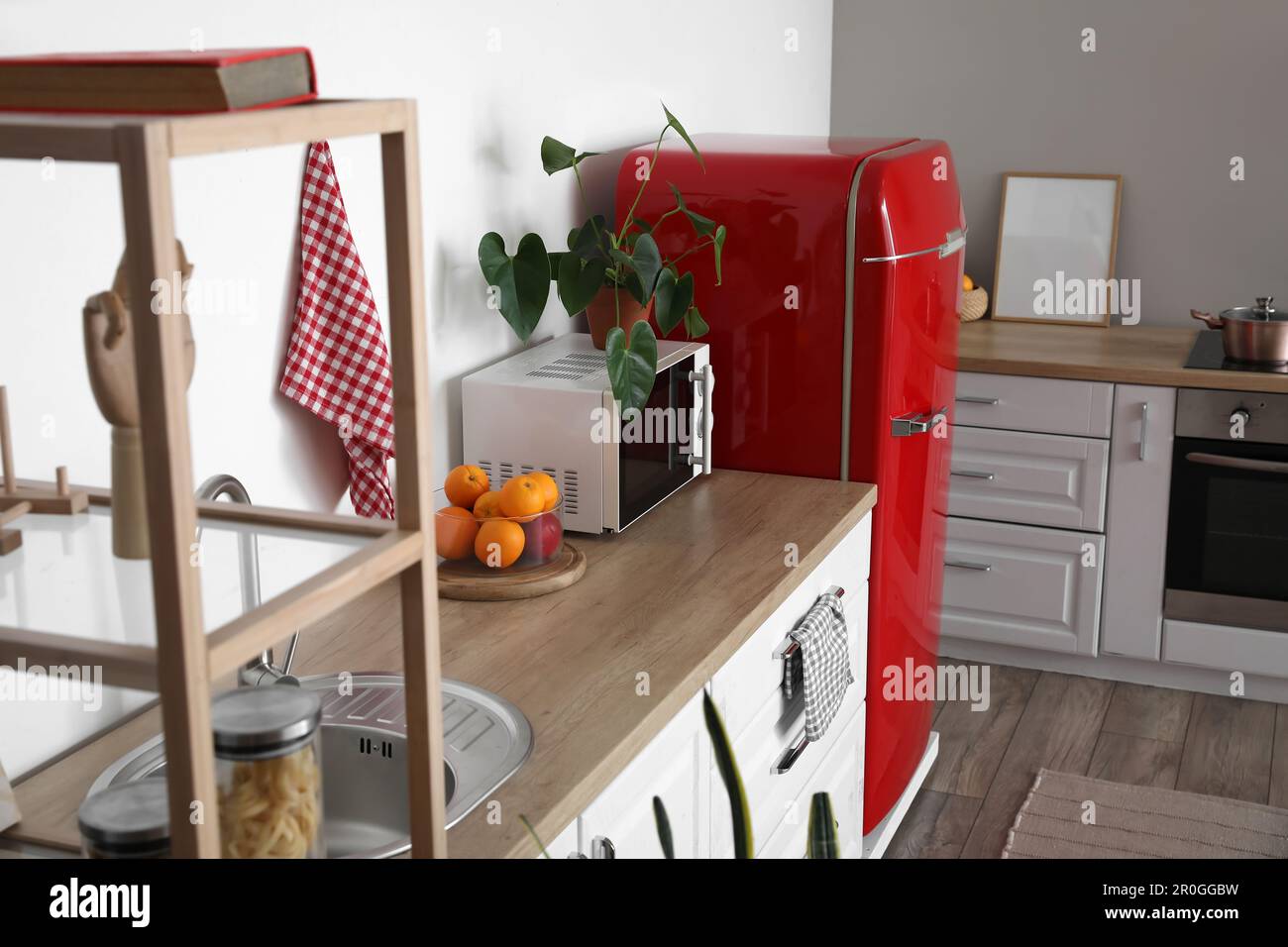Interior of modern kitchen with stylish refrigerator Stock Photo - Alamy