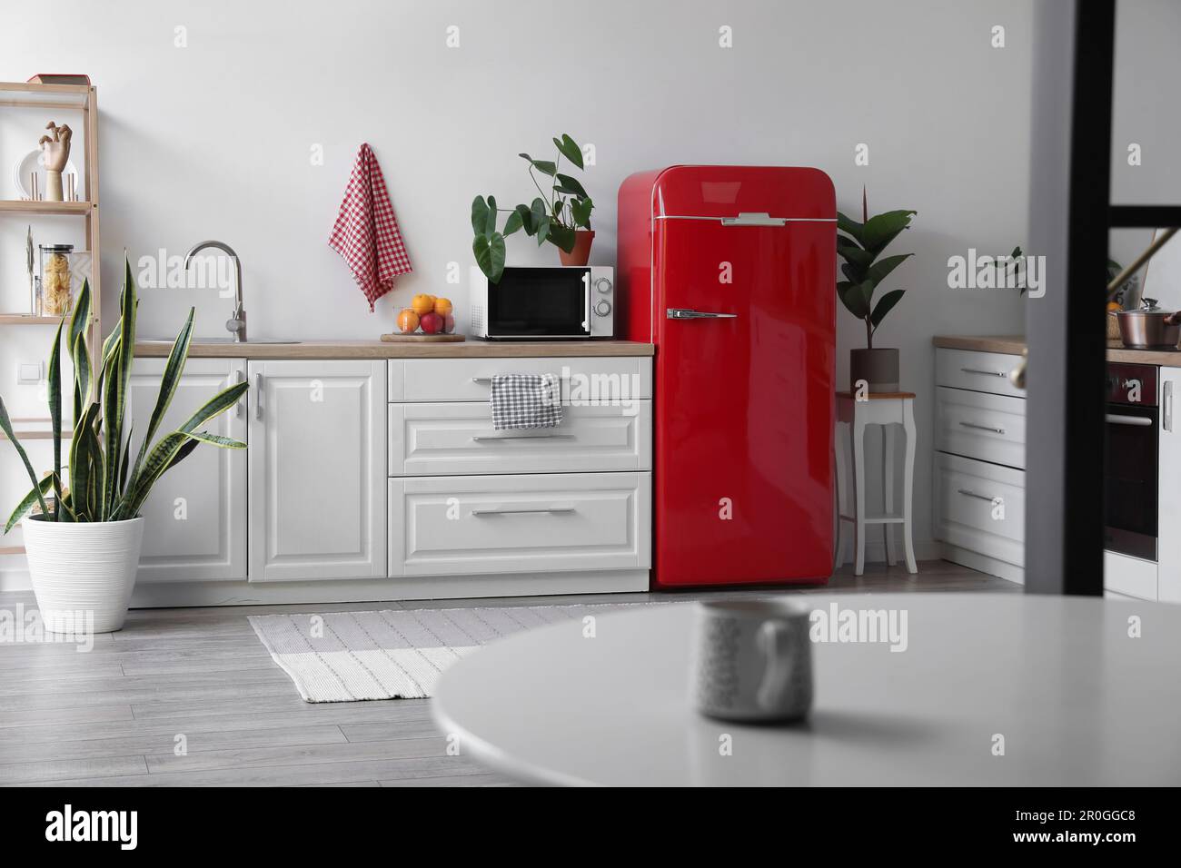 Interior of modern kitchen with stylish refrigerator Stock Photo - Alamy