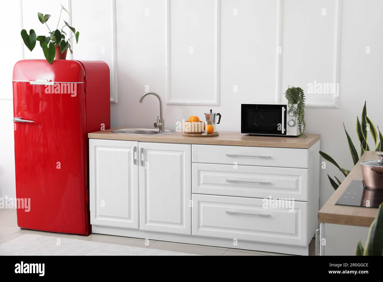 Interior of modern kitchen with stylish refrigerator Stock Photo - Alamy