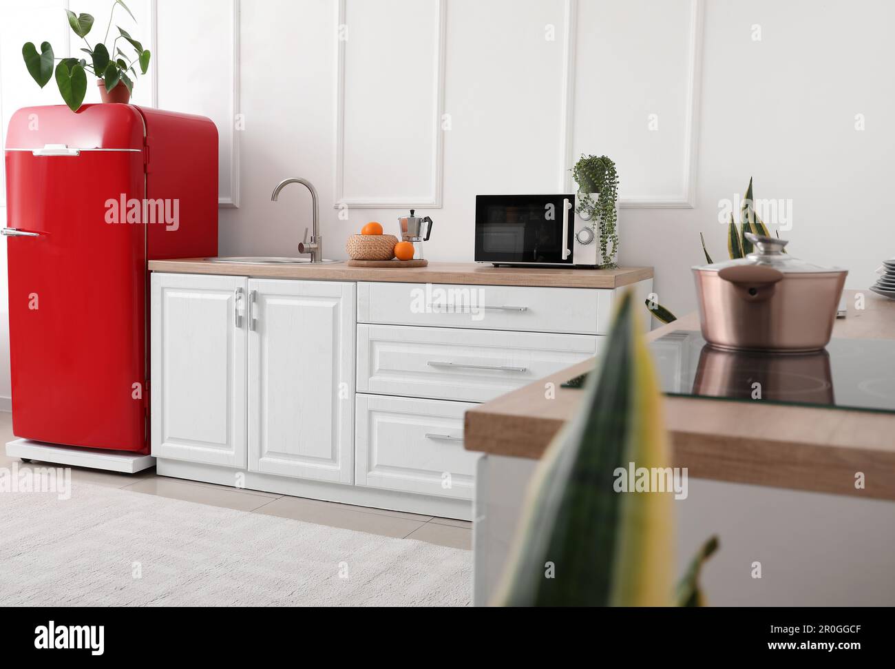 Interior of modern kitchen with stylish refrigerator Stock Photo - Alamy