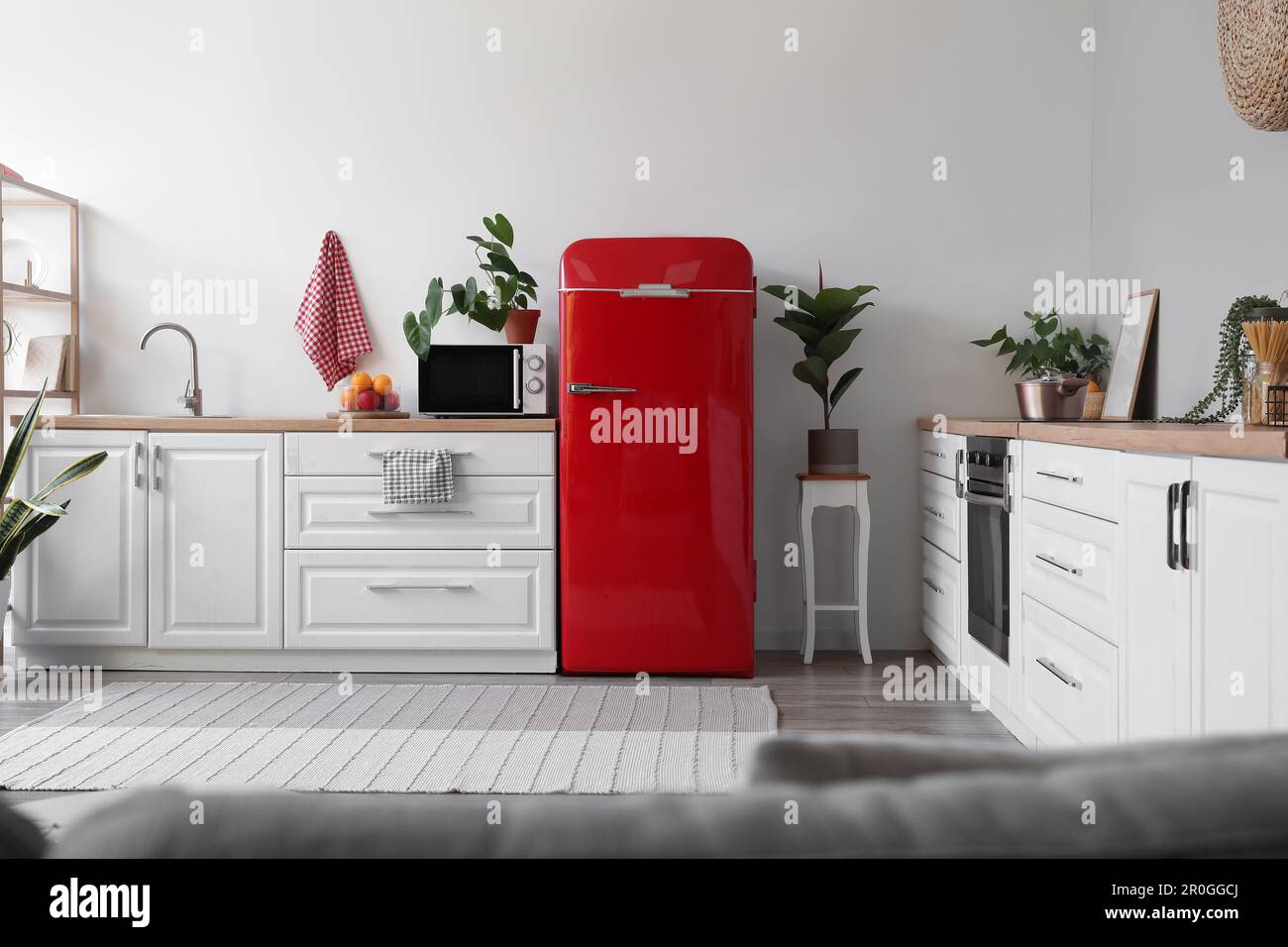 Interior of modern kitchen with stylish refrigerator Stock Photo - Alamy